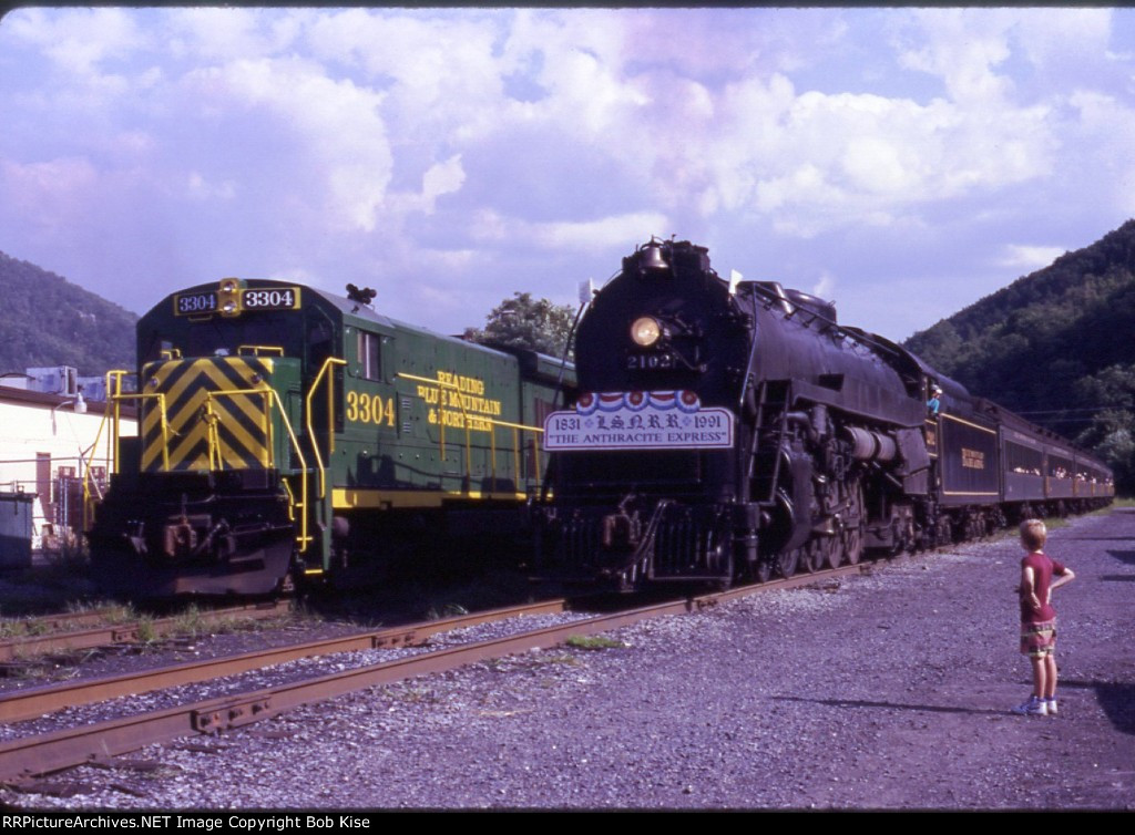 2102 at Tamaqua posing with RBM&N U33B
